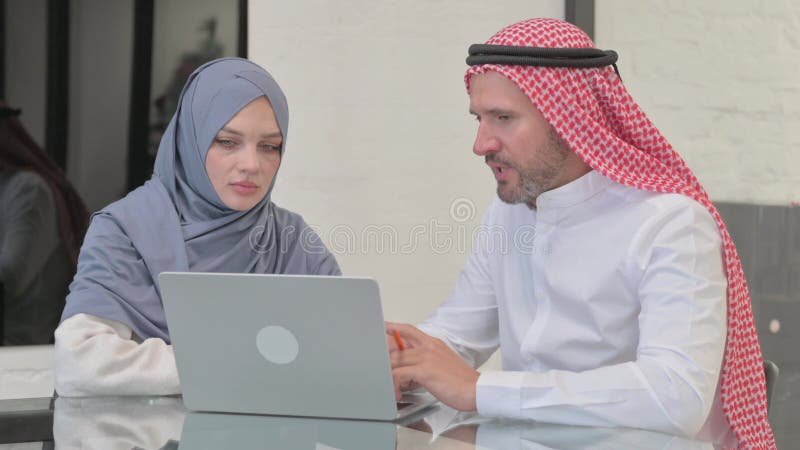 Muslim People Discussing Work in Office Stock Footage - Video of ...