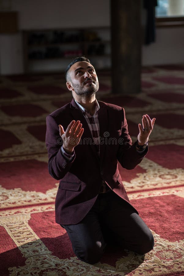 Muslim praying stock image. Image of mobile, holy, face - 88728287