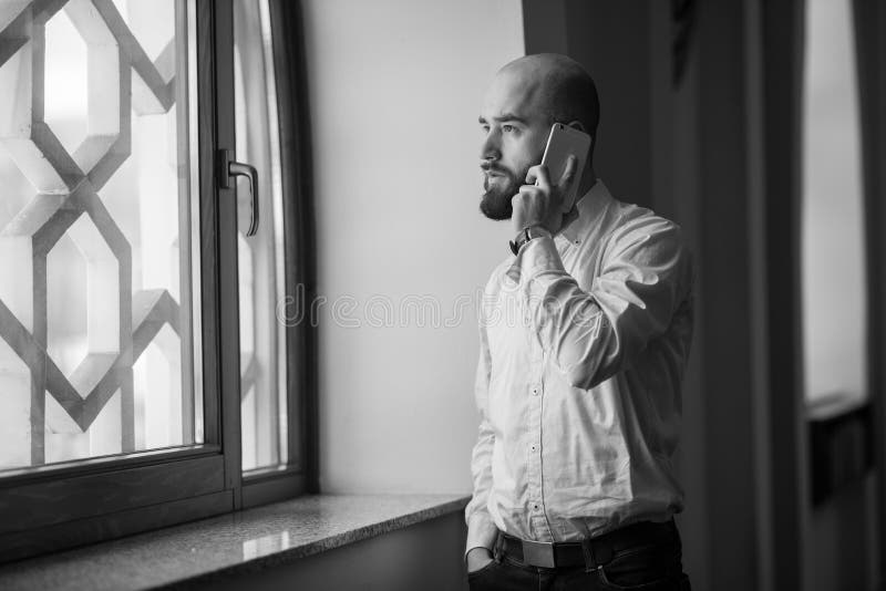 Muslim talking on phone stock image. Image of building - 88843575