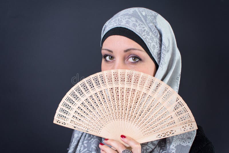 Muslim Woman Behind Hand Fan Stock Photos - Free & Royalty-Free Stock ...