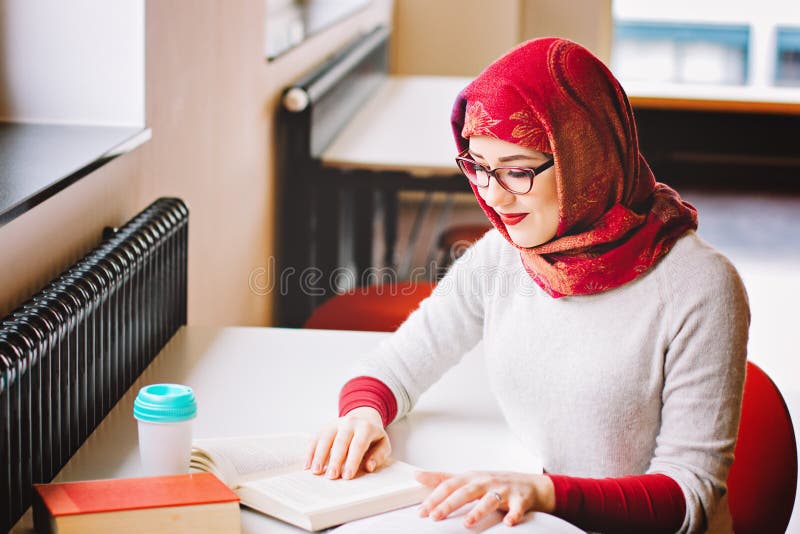Muslim Woman at the Library Stock Image - Image of hijab, attractive ...