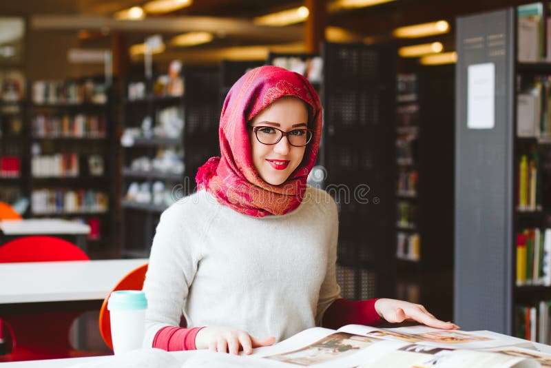 Muslim Woman at the Library Stock Photo - Image of arabic, female: 70960376