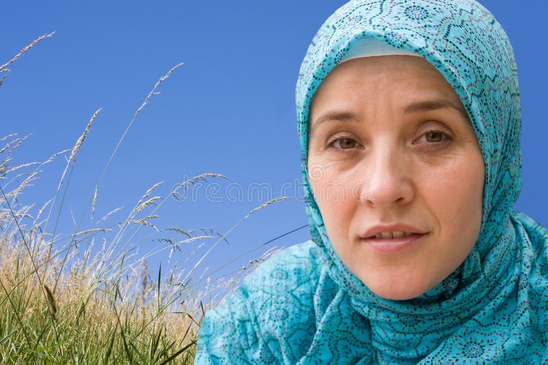 Muslim woman in nature stock image. Image of islamic - 15269947