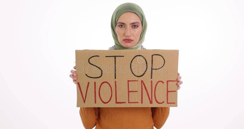 Muslim Woman Shows Stop Violence Sign on White Background Stock Video ... Muslim Woman Shows Stop Violence Sign on White Background Stock Video ...