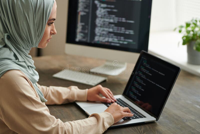 Muslim Woman Working As it Specialist Stock Photo - Image of hijab ...
