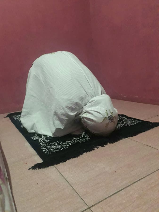 A Muslim Women Bow Down for Praying To Her God Stock Image - Image of ...