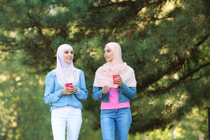 Muslim Women with Cups of Coffee Walking Stock Image - Image of happy ...