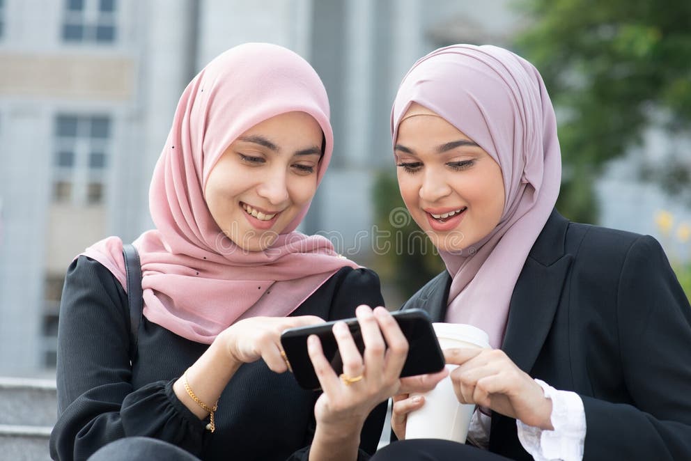 Muslim Women Using Smart Phone Stock Photo - Image of cell ...