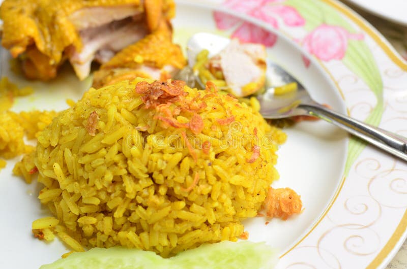 Muslim Yellow Rice with Chicken Stock Photo - Image of cooked, gourmet ...