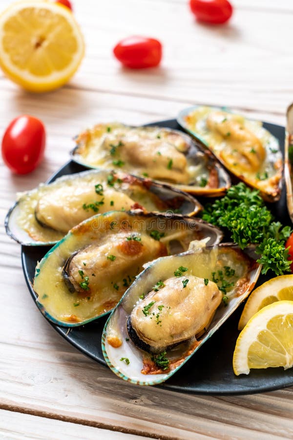 Mussel baked with cheese stock photo. Image of mussels - 151944994