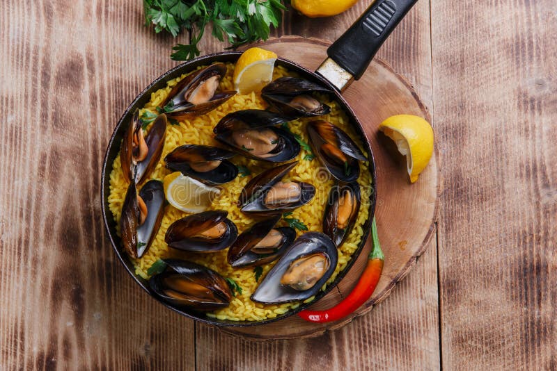 Mussel paella stock photo. Image of food, closeup, yellow - 56395936