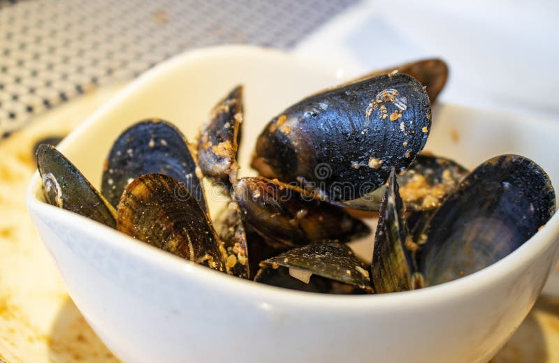 Mussel Shells in Dish on Table in Restaurant Stock Photo - Image of ...