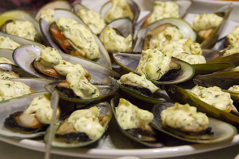 Mussels with Cream and Garlic Sauce on a Platter Stock Image - Image of ...