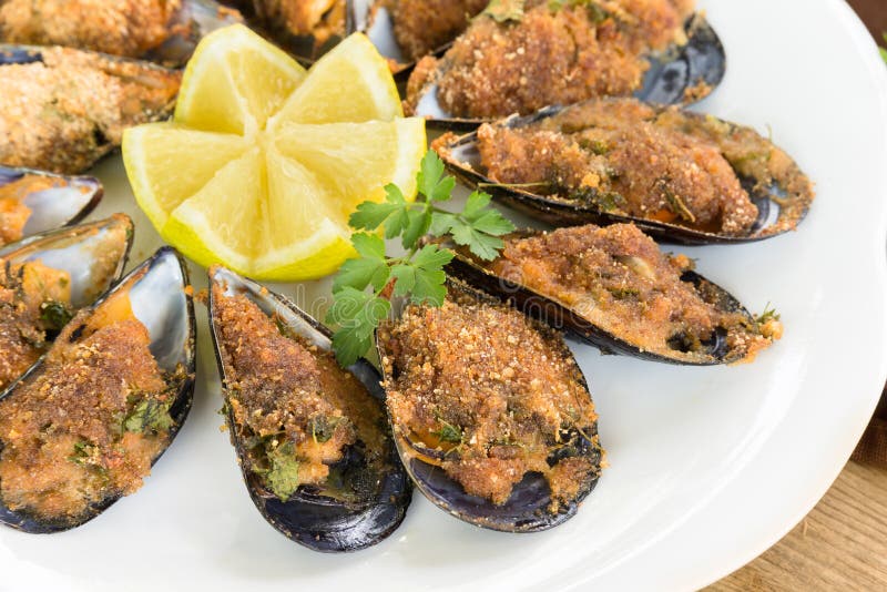 Mussels gratin stock photo. Image of lemon, cooking, dish - 56613544