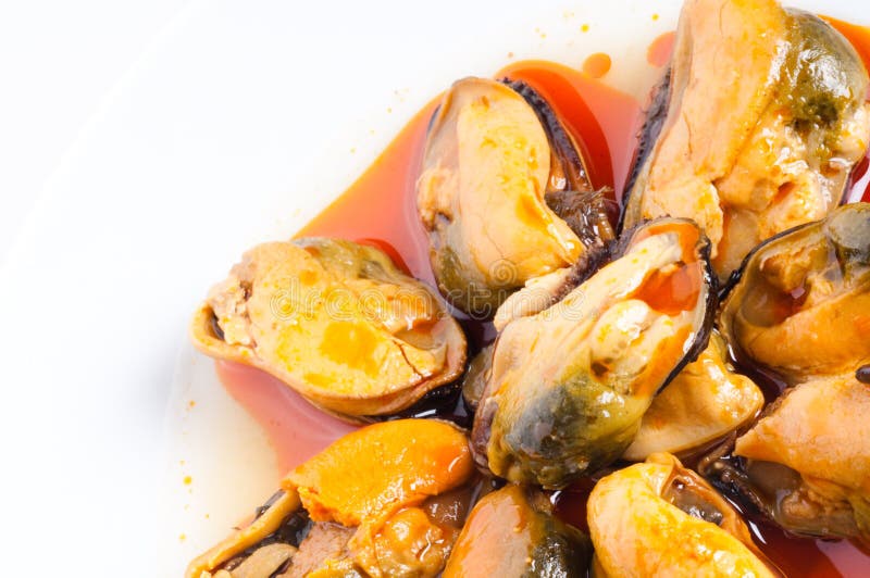 Mussels in red sauce stock image. Image of clams, omega - 12924747