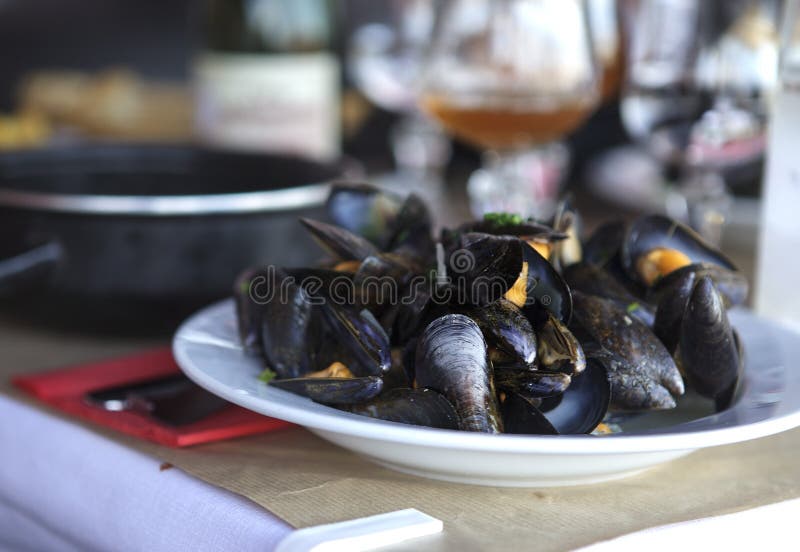 Mussels at Restaurant in Normandy Stock Photo - Image of silverware ...