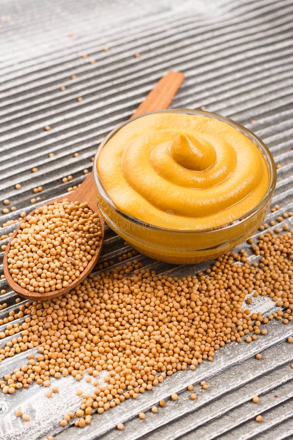 Mustard in a Bowl on a Rustic Background Stock Photo - Image of grain ...