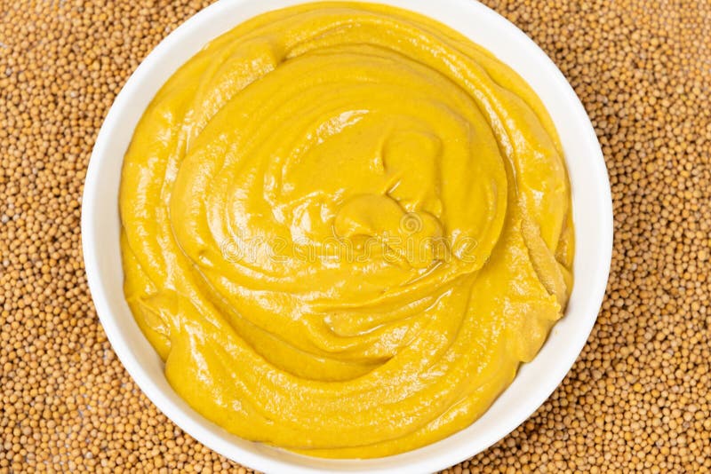 Mustard Sauce and Dry Mustard Seeds, Top View. Stock Photo - Image of ...