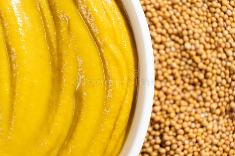 Mustard Sauce and Dry Mustard Seeds, Top View. Stock Photo - Image of ...