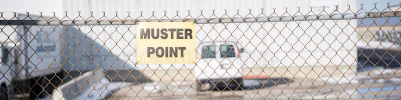 Muster Point Sign Attached To Chain Link Fence Stock Image - Image of ...