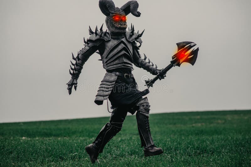 Mutant Warrior Runs on Meadow and Holds Mace in His Hands Stock Image ...