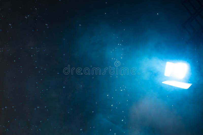 Muted Blue Light Passes through the Rain and Fog. Stock Image - Image ...