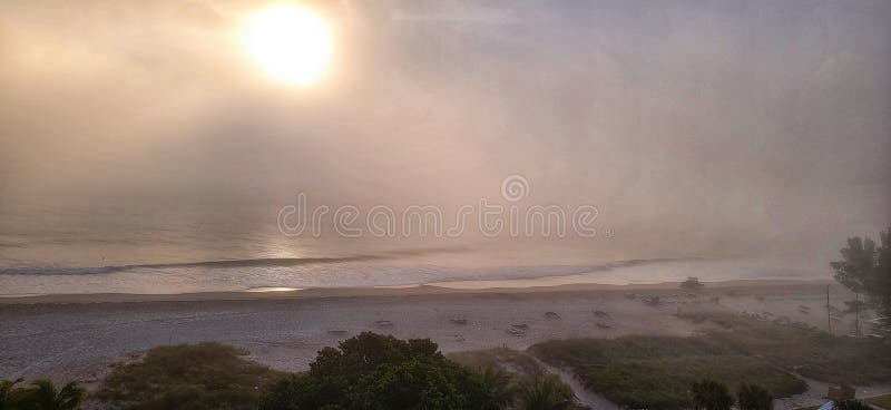 Muted sunrise over ocean stock image. Image of haze - 243354947