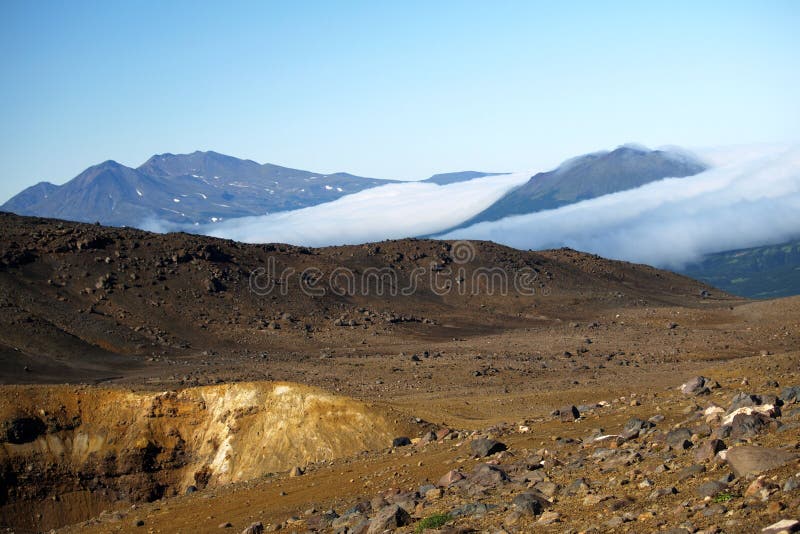 Mutnovsky Volcano. View of the Green Mountain Valley Under the Clouds ...