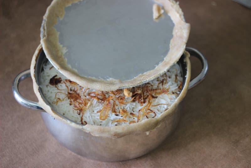 Mutton Biriyani Inside the Open Pot after Breaking the Sealed Edges ...