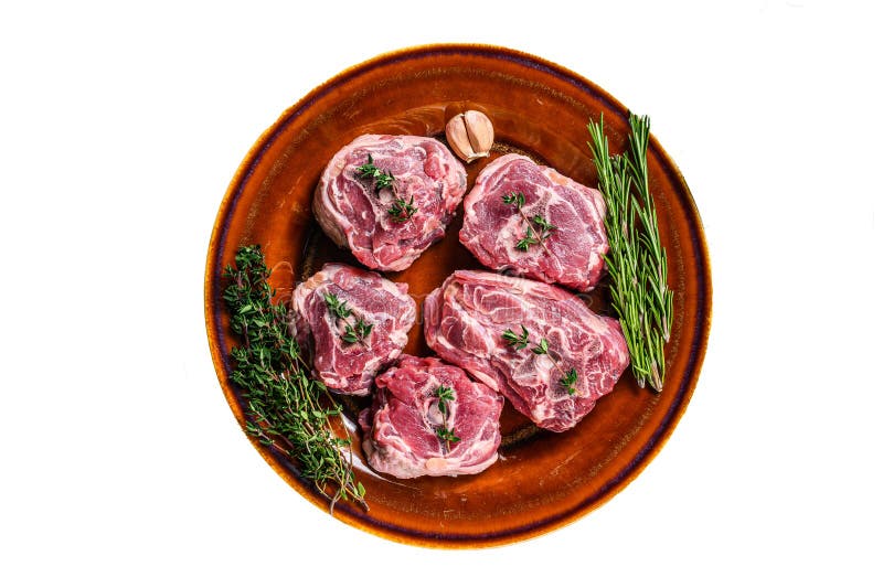 Mutton Lamb Neck Meat on a Rustic Plate with Thyme and Rosemary ...