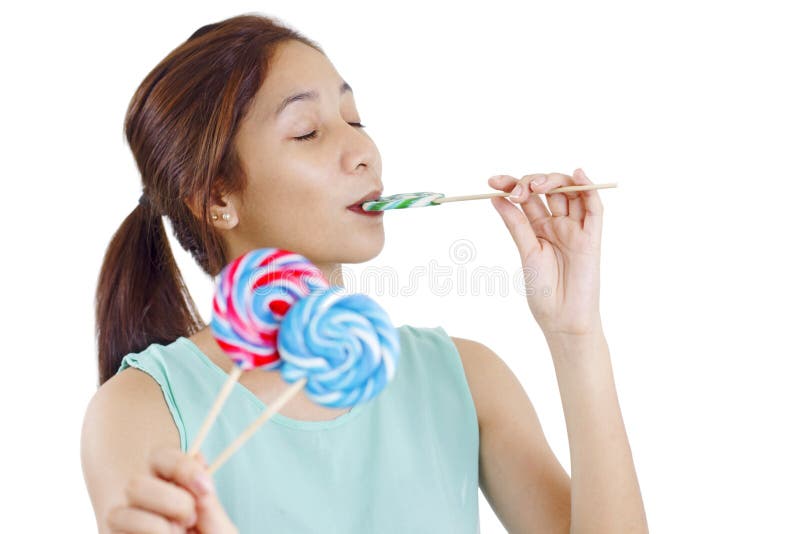 Lady eating a cotton candy stock photo. Image of food - 13613250