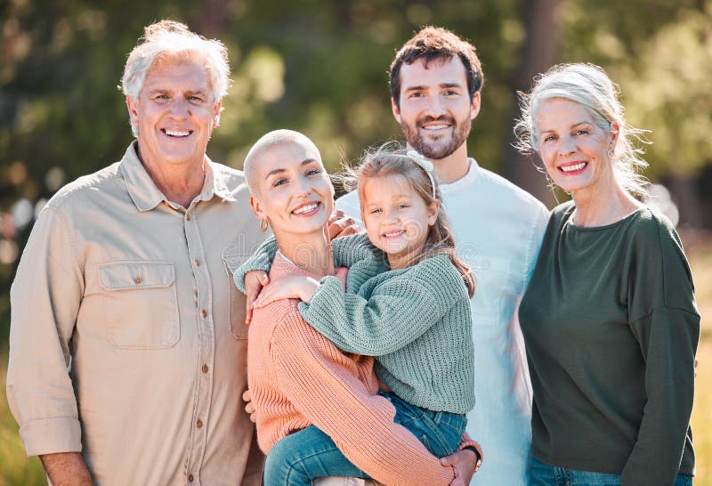 This is My Clan. a Multi-generational Family Posing Together Outdoors ...