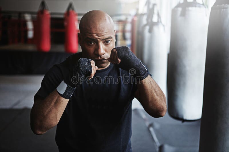 My Courage is Stronger Than My Fear. a Kick-boxer Training in a Gym ...