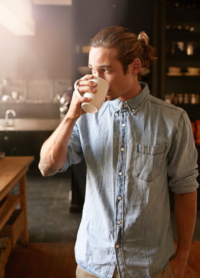 My Day Starts after Coffee. a Handsome Young Man Having Some Coffee at ...
