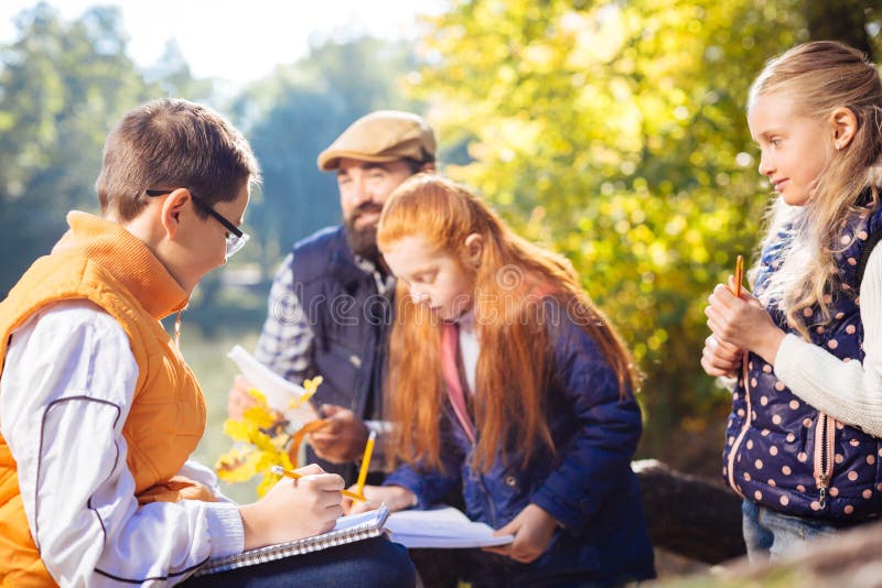 Nice Cute Smart Boy Holding a Pen Stock Photo - Image of caucasian ...