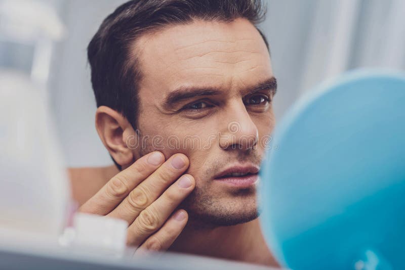 Handsome Nice Man Looking into the Mirror Stock Image - Image of mirror ...