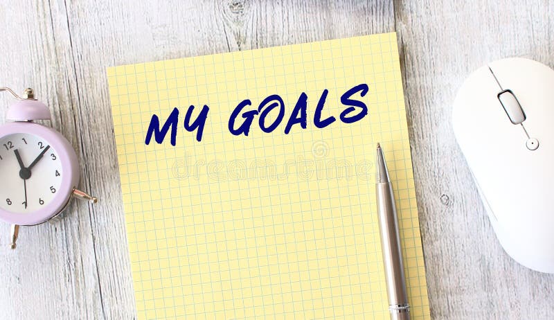 MY GOALS Text Written in a Notebook Lying on a Wooden Work Table Stock ...