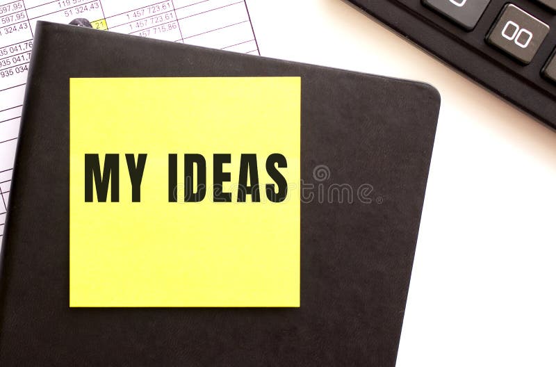 MY IDEAS Text on a Sticker on Your Desktop. Diary and Calculator Stock ...