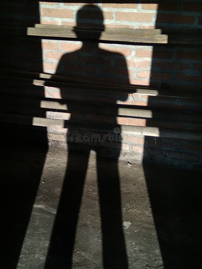 Shadow at the Door stock photo. Image of shadow, darkbackgrounds ...