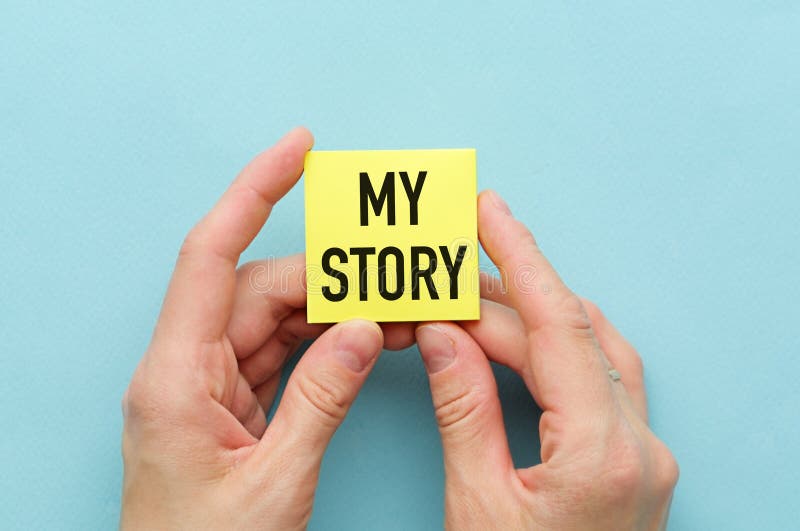 My Story Text on Yellow Notice Paper on Notepad or Diary in Hands Stock ...