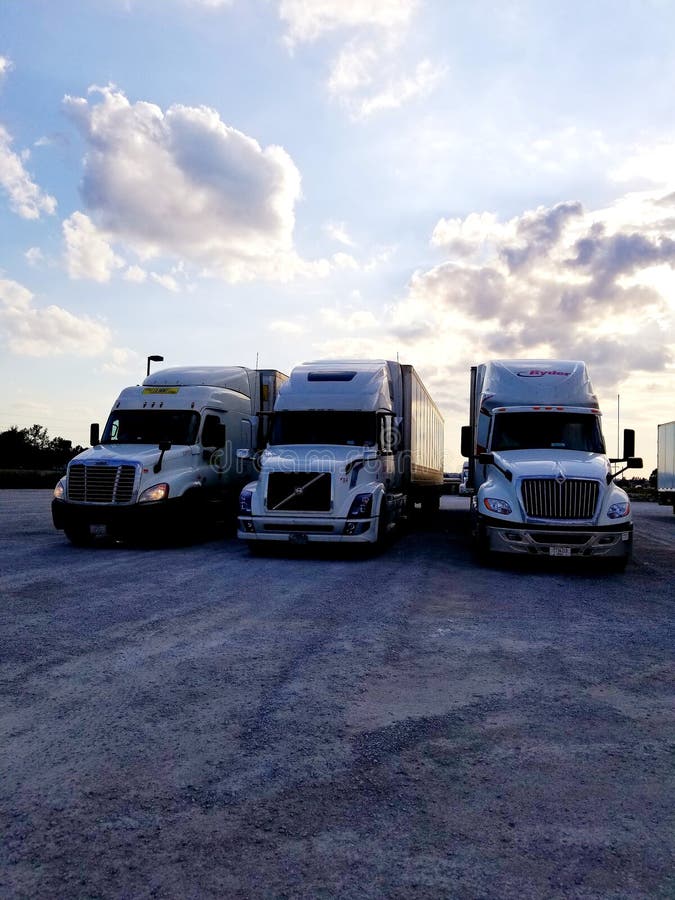 Tractor with Two Trailers at Harvest on a Wheat Field Editorial Stock ...
