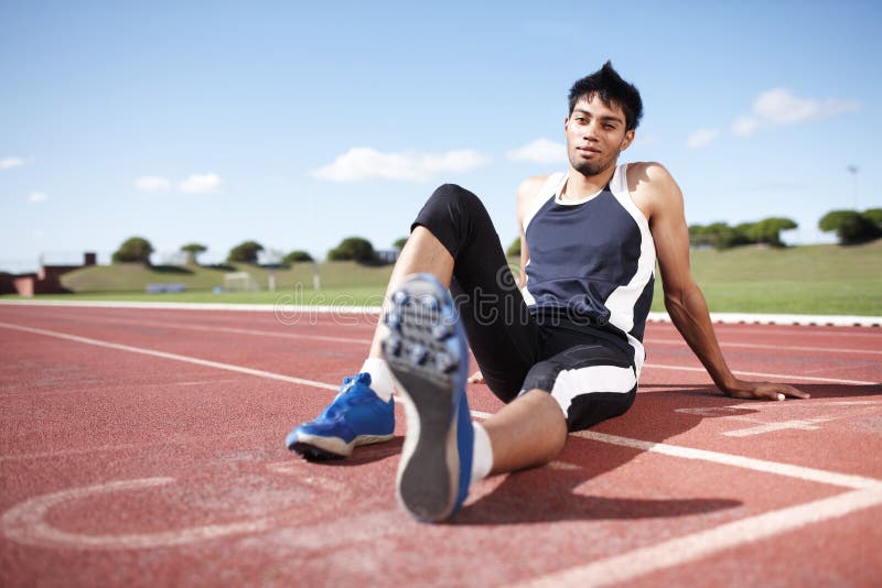 This is My Turf. a Young Athlete Leaning Back on a Running Track. Stock ...