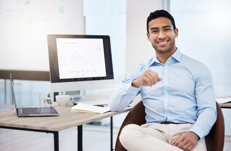 My Work Space is Optimized for Productivity. a Young Businessman ...