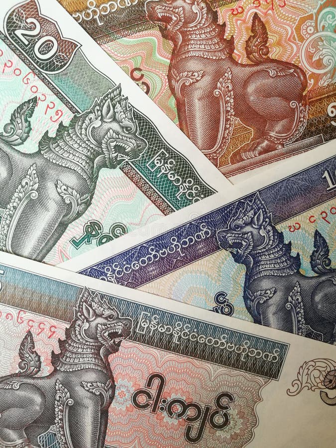 Myanmar Kyats on Many Dollars Background Stock Image - Image of number ...