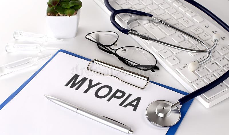 MYOPIA Text on White Paper on White Background. Stethoscope ,glasses ...