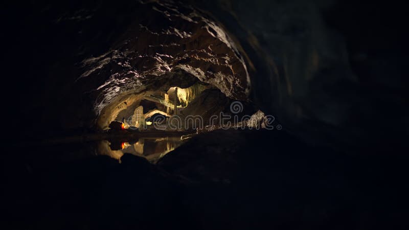 A Mysterious Cave with Dim Light Reflection that Evokes Curiosity and ...