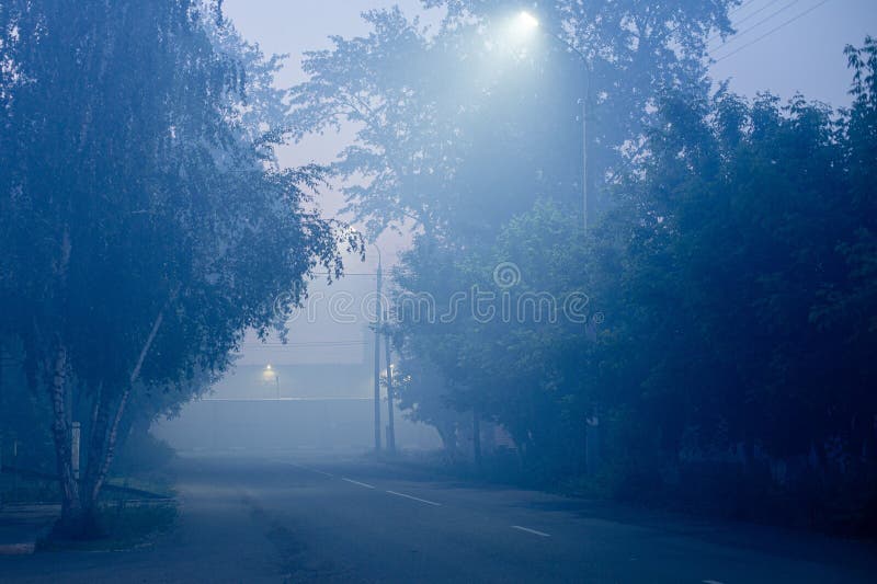 Mysterious Fog on the Street in a Small Town at Night Stock Image ...