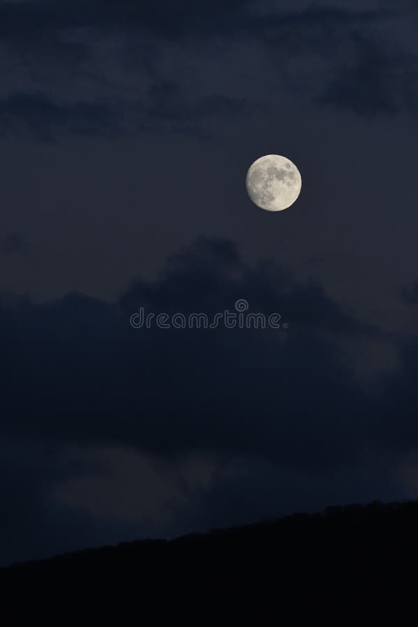 Mysterious Full Moon in the Dark Night Sky, in a Vertical Shot Stock ...