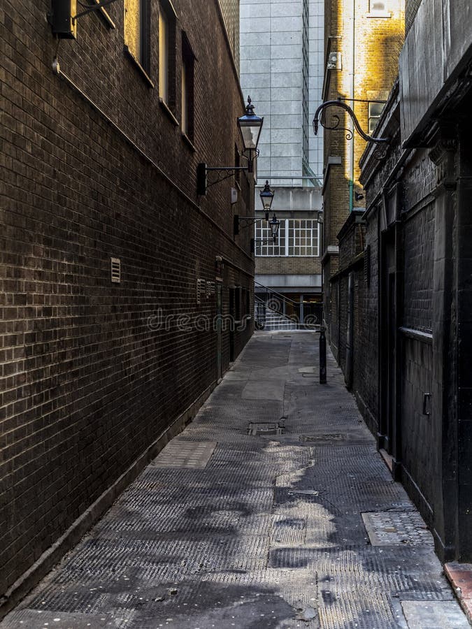 A Mysterious, Grimy and Hidden Old Back Alley in London Stock Image ...