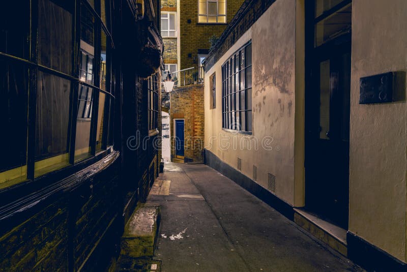 A Mysterious and Hidden Old Back Alley in London at Night Stock Photo ...